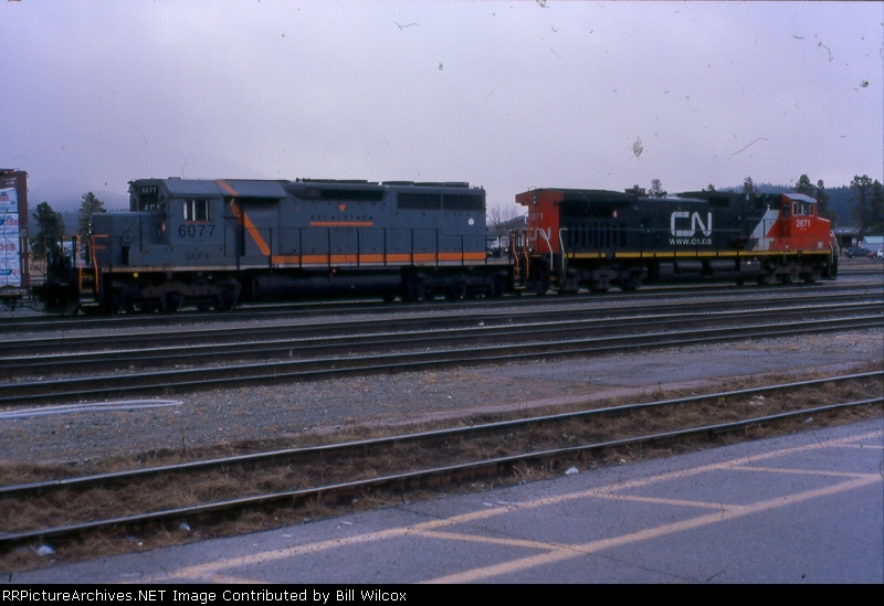CN 2671 & GCFX 6077 wait for a crew